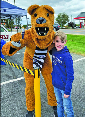 Young fan treasures time meeting Penn State mascot | News, Sports, Jobs ...